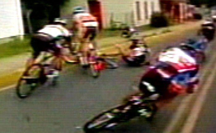 Bicycle racers crash after tacks are thrown onto course | king5.com