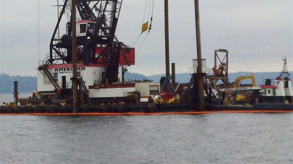 Crane hauls up sunken 73-foot workboat | king5.com