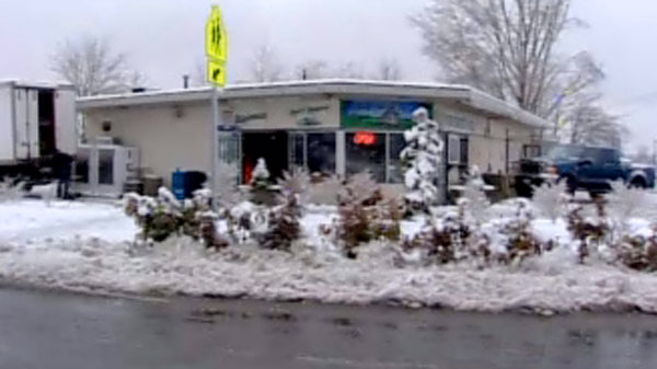 Family-owned Covington store refuses to close in storm | king5.com