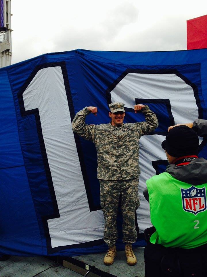 Blind officer raises the 12 flag at Seahawks game | king5.com