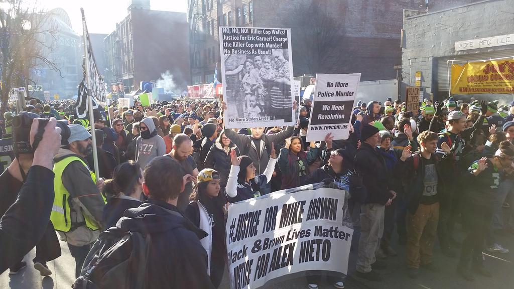 Group protests outside stadium before Seahawks game | king5.com