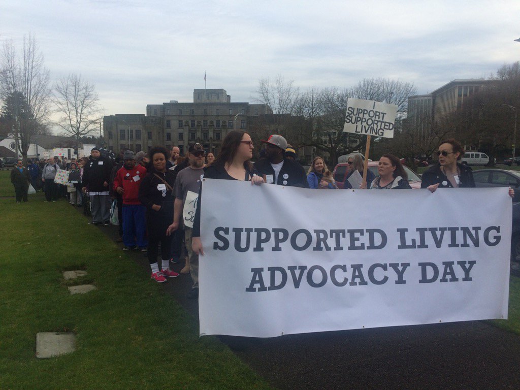 Caregivers for the disabled rally for better pay | king5.com