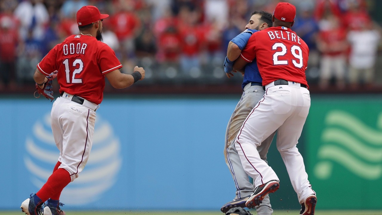 Blue Jays-Rangers feud simmering since playoffs erupts in brawl | king5.com