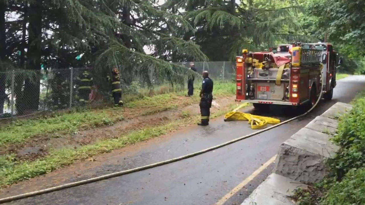 Firefighters extinguish fire at Jungle homeless camp | king5.com