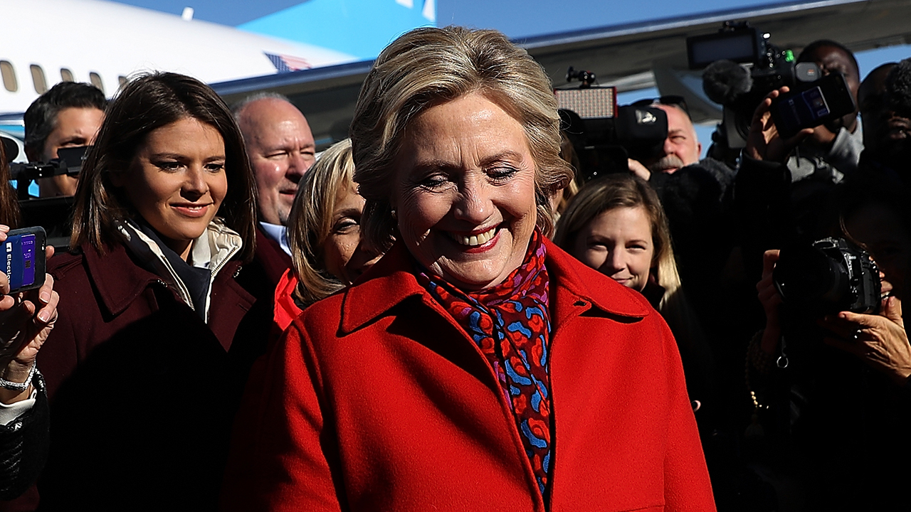 Clinton hopes to strike positive note as campaign enters final day ...