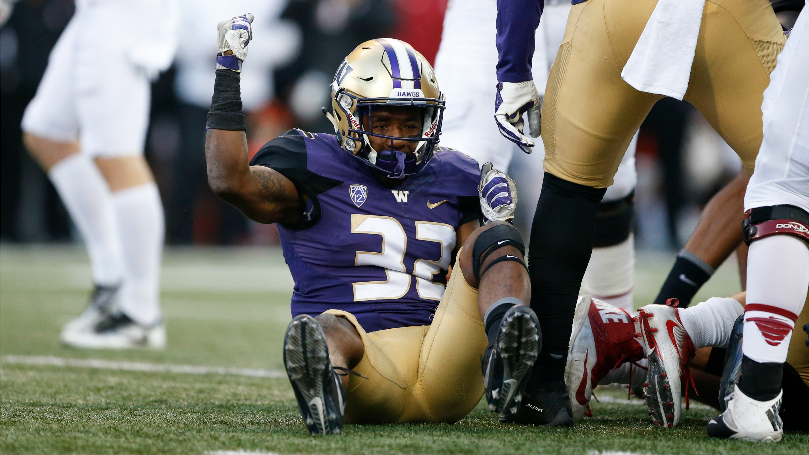 Cardinals move up 9 spots to draft DB Budda Baker | king5.com